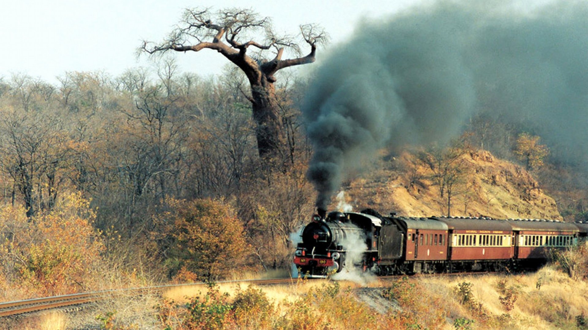 Historic Train Journey Through Scenic Landscapes