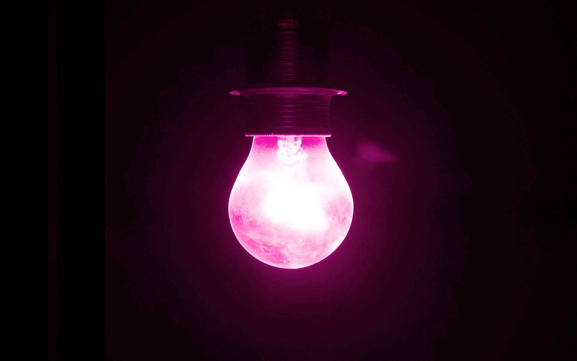 Glowing Pink Light Bulb: A Man-Made Radiance