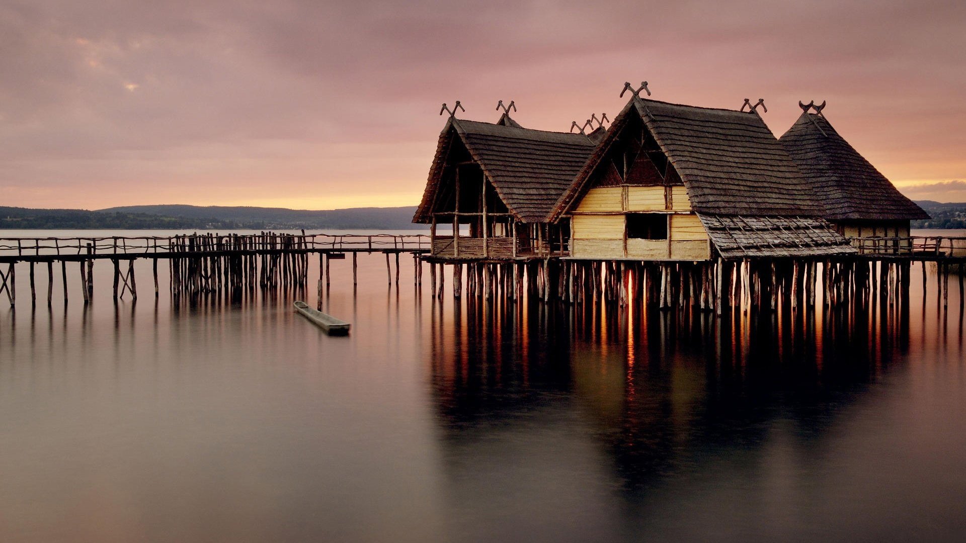 Tranquil Man-Made House Over Water at Dusk