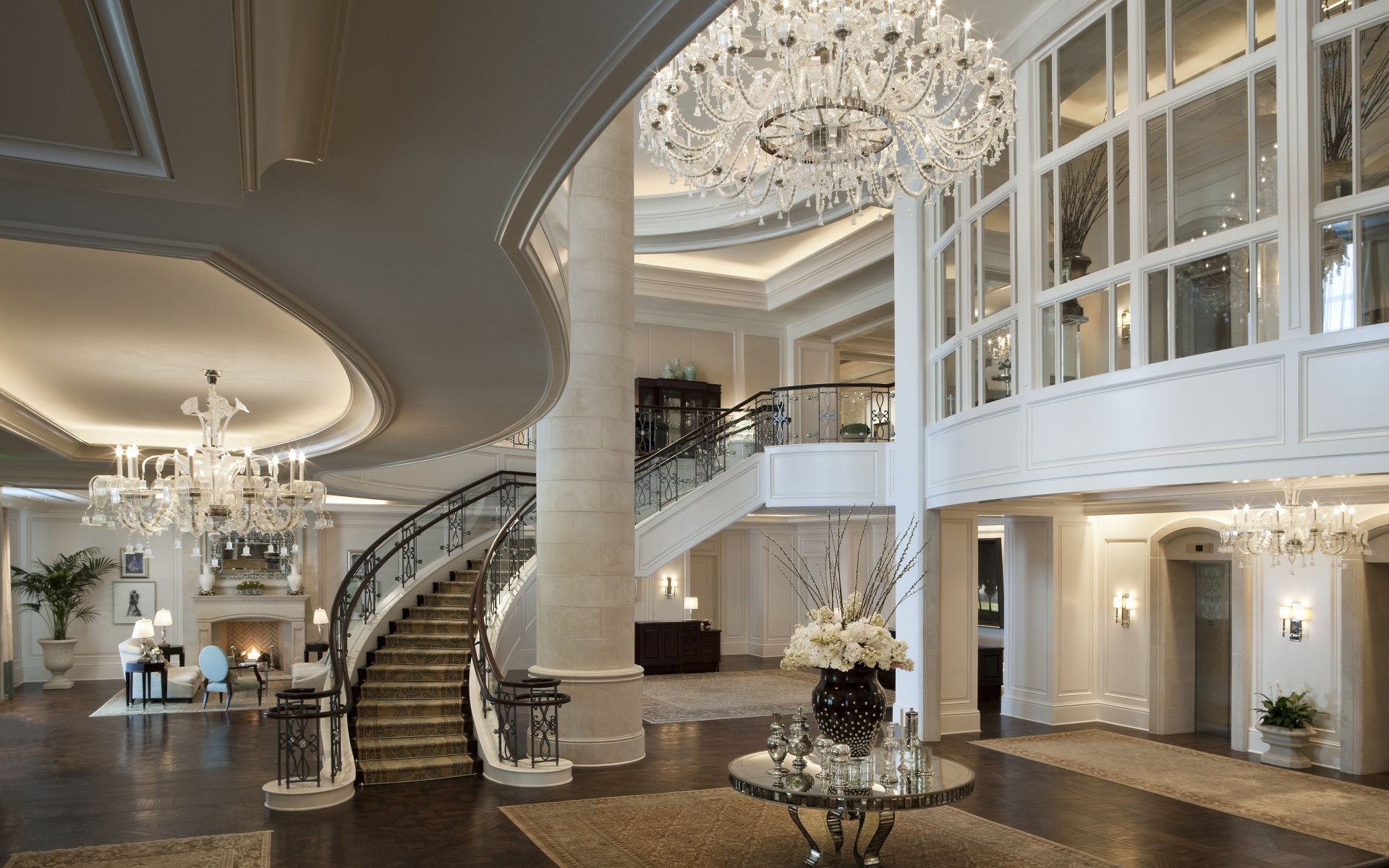 Elegant Man-Made Interior: Grand Room with Staircase and Chandeliers