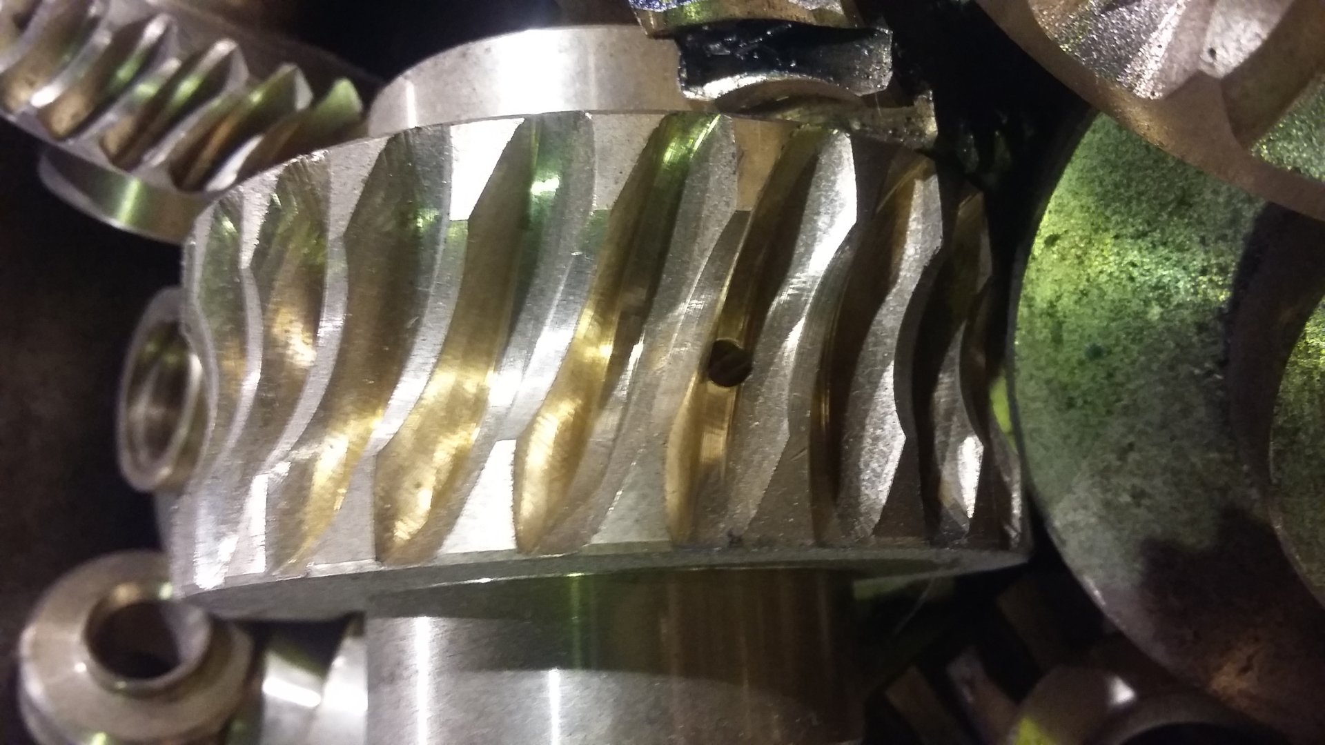 Intricate Close-Up of Metallic Gears in Motion by TorinoGT