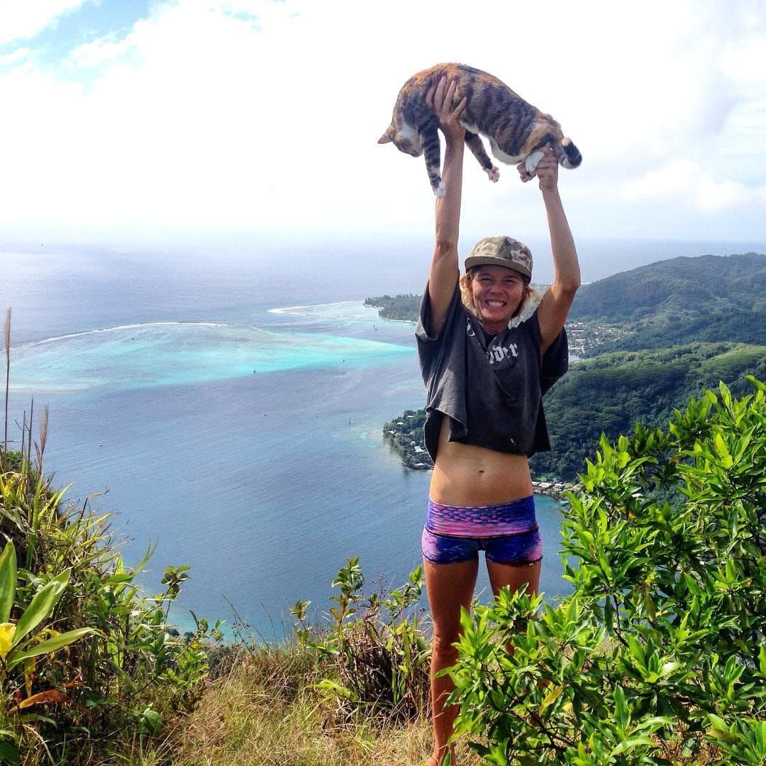 Captain Lizzy Clark and Amelia the cat recreating the lion king by ...