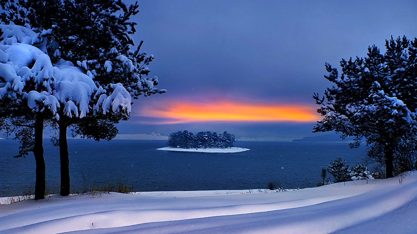 Winter Island Sunset Over a Snow-Covered Lake