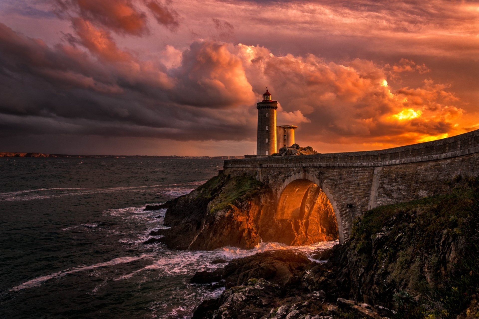 Sunset Serenity: A Lighthouse by the Sea