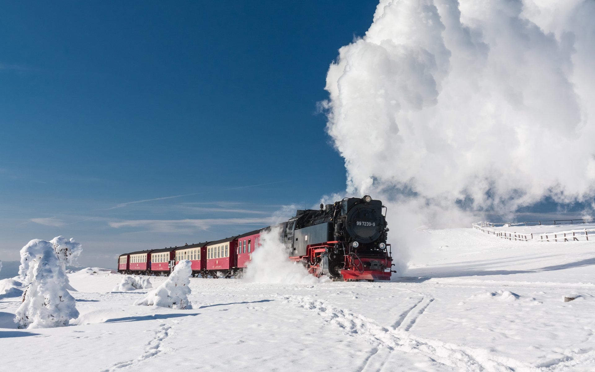 Winter Steam Express: Locomotive Plowing Through Snow