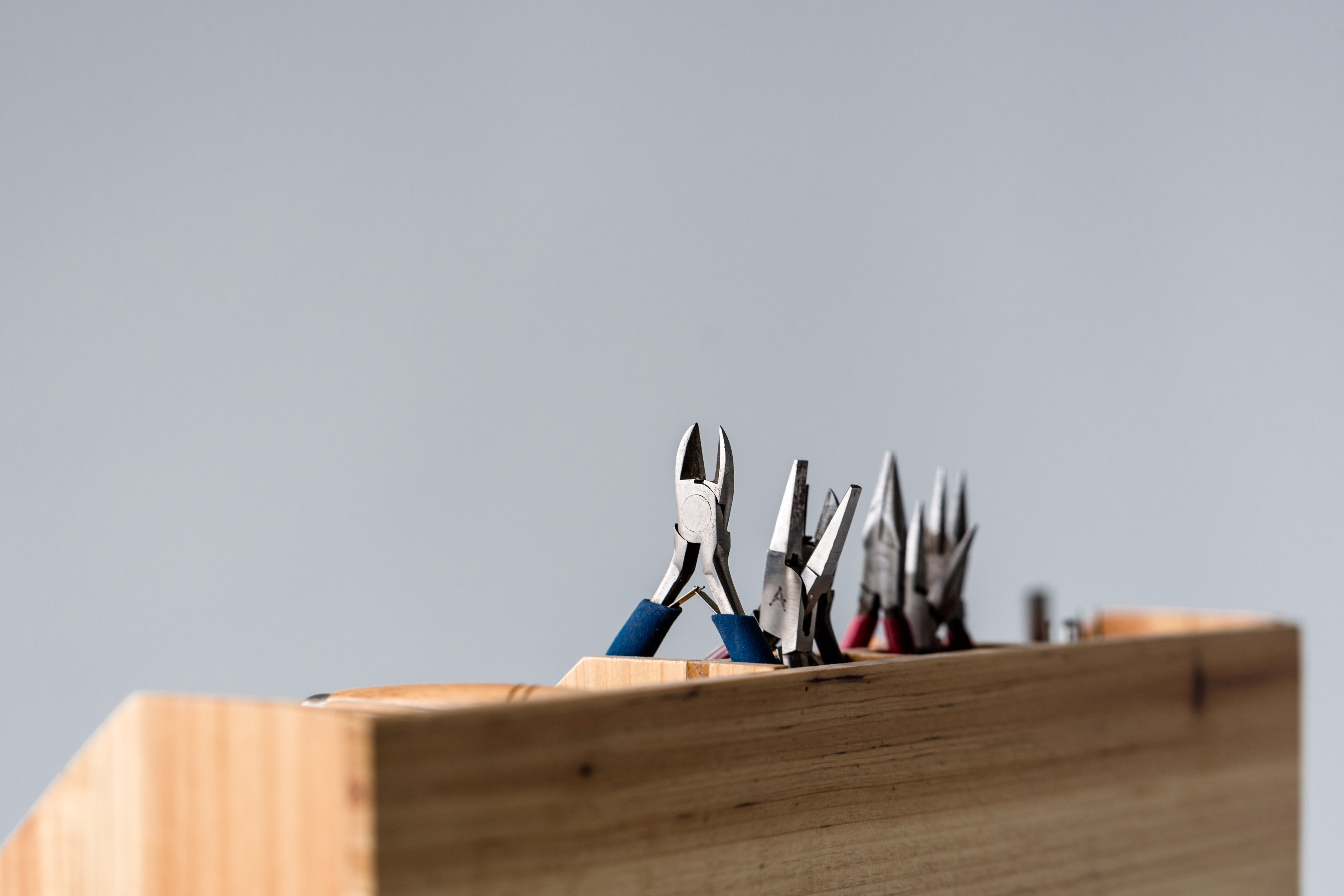 Hand Tools Stored In Wooden Holder - Image Abyss