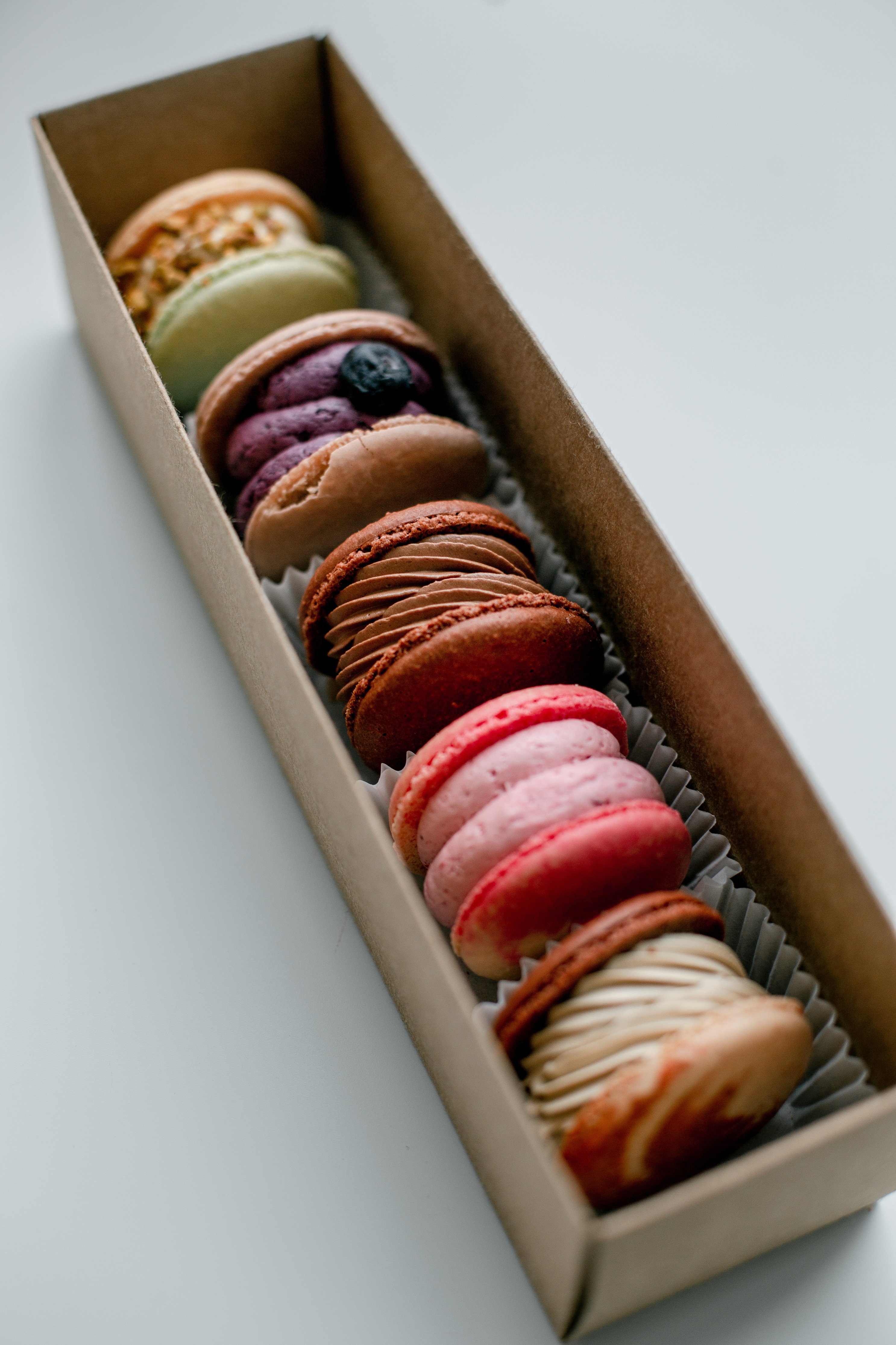 Boxed Macarons In A Line - Image Abyss