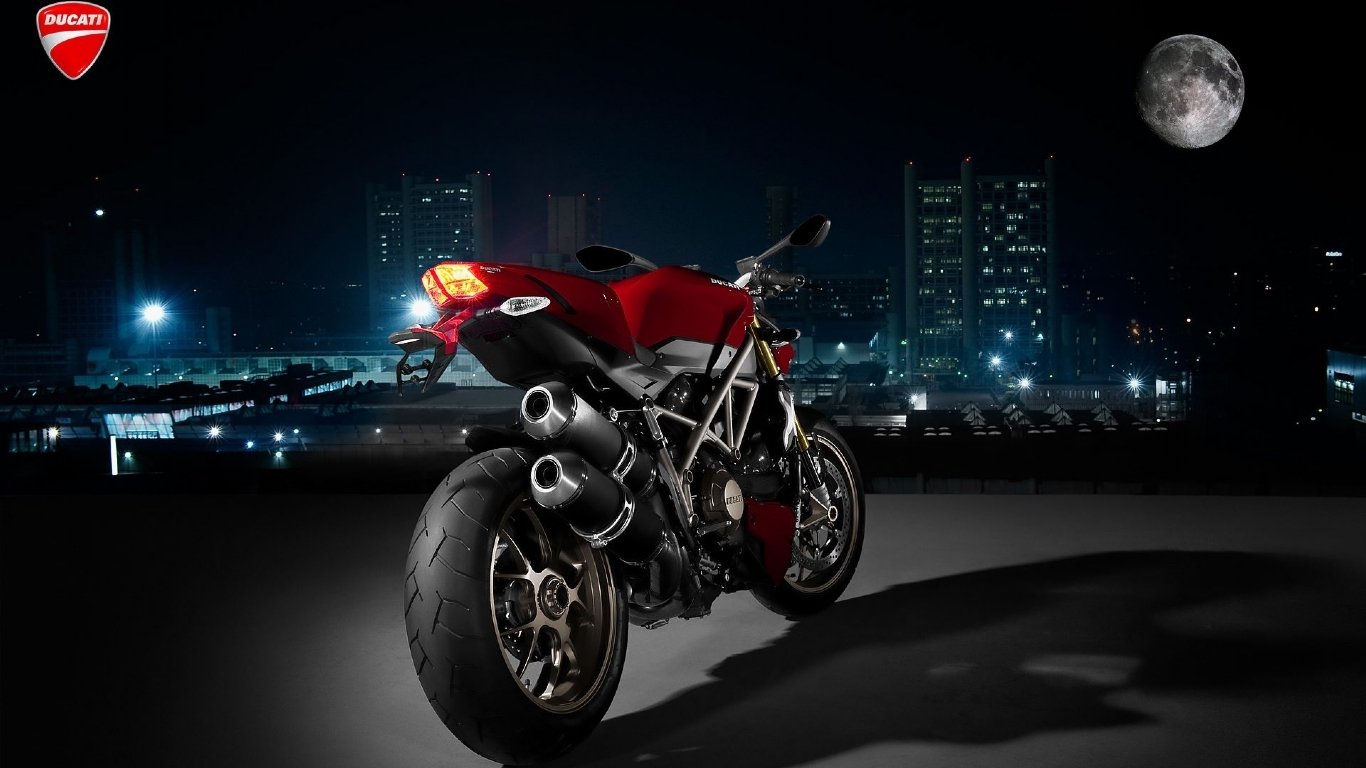 Ducati Night Rider: Sleek Motorcycle Mastery Under the City Moon