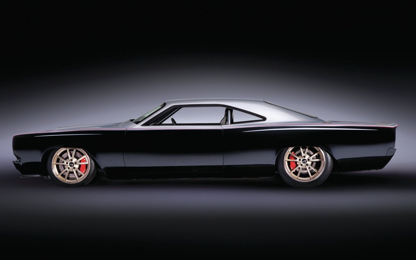 Sleek Black Muscle Classic with Modern Performance Wheels