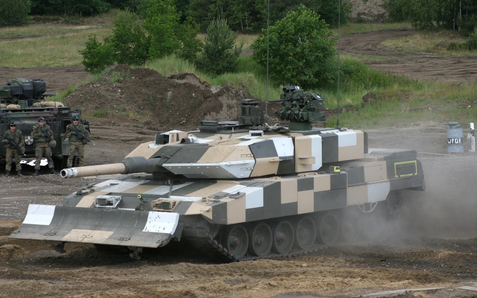 Leopard 2 Tank and Soldier: Frontline Military Power in Action